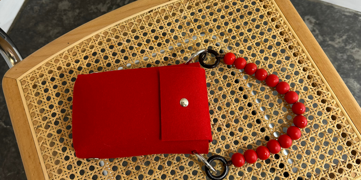The Bold Allure of Red Accessories and Felt Bags | Katya Komarova